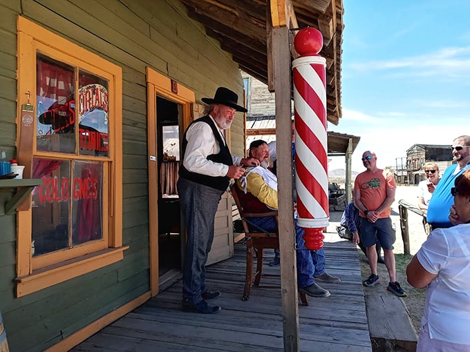 Shave and a haircut, two bits! Or in this case, a close shave and a lot of laughs. These cowboys know how to put on a show! Photo credit: Tim Self