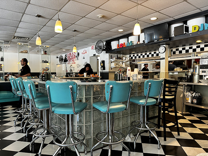 The heart of Lola's &ndash; where magic happens and calories don't count. Watch the short-order symphony unfold before your eyes.