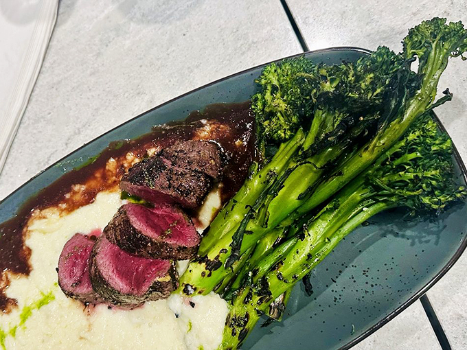 Beef tenderloin that's more tender than a Nicholas Sparks novel. Paired with vibrant veggies, it's a land-and-sea love story on a plate. Photo credit: Rachelle S.
