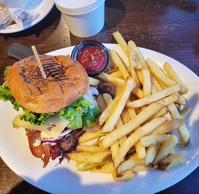 Who says seafood joints can't flip a mean burger? This beefy beauty proves Whitey's isn't just a one-trick pony fish. It's a culinary chameleon!