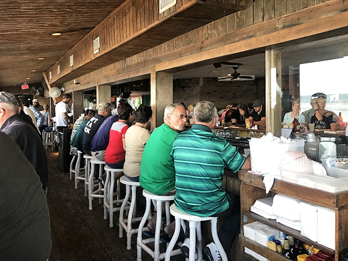 The bar area – where ocean views and cold brews create the perfect recipe for "I'll just have one more" syndrome.