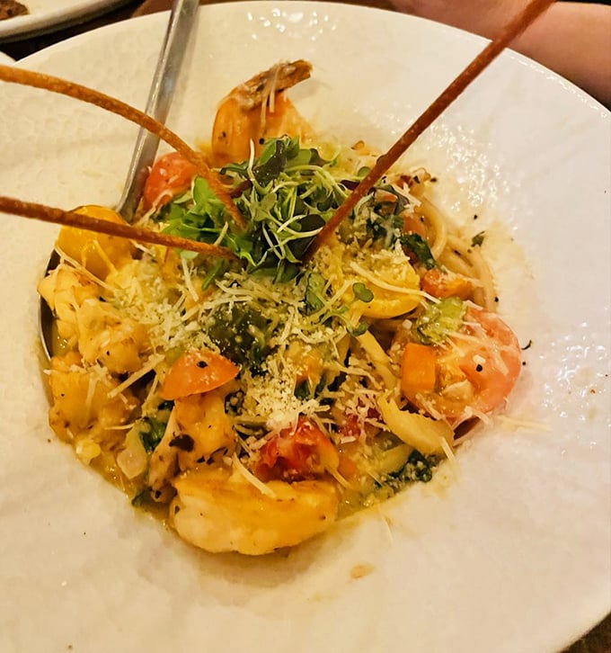 Pasta that's dressed to impress! This seafood stunner is like a beach vacation for your taste buds. Photo credit: Ashley N.