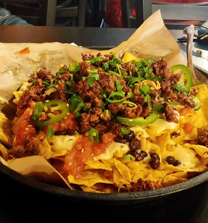 Nacho average appetizer! This cheesy, meaty masterpiece is what happens when bar food gets a gourmet makeover.