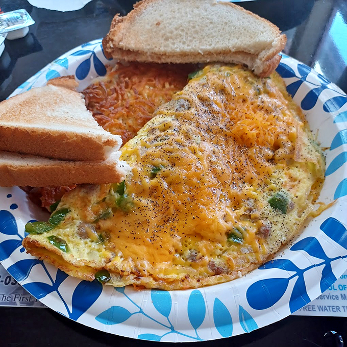 Cheese pull for the soul! This omelet is packed with so much goodness, it's practically bursting at the seams.