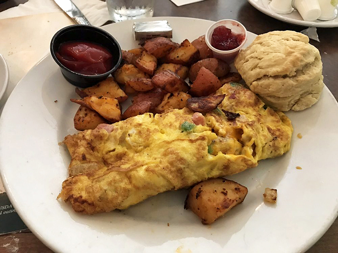 Breakfast of champions! This omelet is so fluffy, it might float away if not for those hearty home fries anchoring the plate. Photo credit: Robin K.