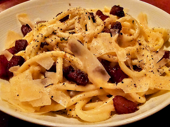 Pasta perfection that would make an Italian nonna weep with joy. It's a carb-lover's dream, twirled with more charm than a Frank Sinatra song.