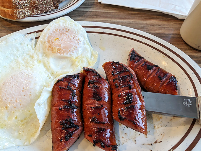 These grilled sausages aren't just breakfast - they're your morning's main character, with eggs playing the faithful sidekick.