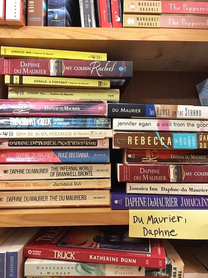 "Jenga, but make it literary." These precariously stacked tomes are a testament to the store's overflowing abundance of books.