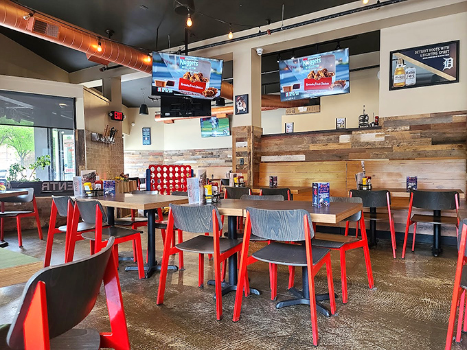 Red chairs, ready for action! This dining room is primed for everything from first dates to 