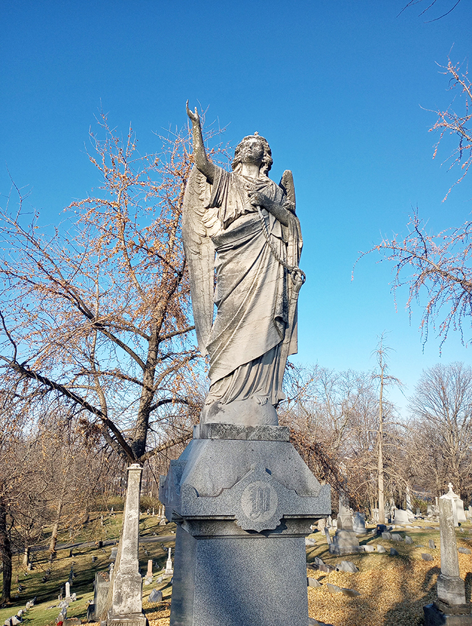 Heavenly heights! This angelic statue reaches for the sky, giving new meaning to 'stairway to heaven.' Talk about divine architecture!