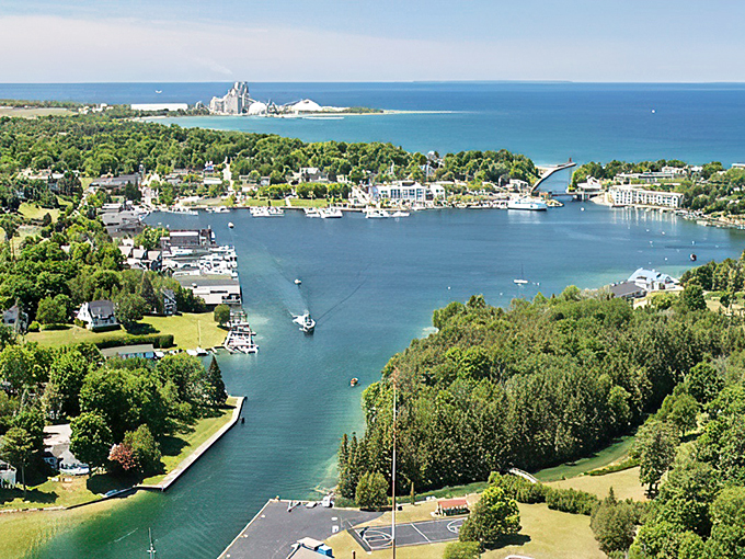 Charlevoix's lighthouse stands sentinel, guiding visitors through fog and fantasy alike.