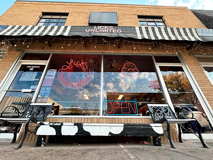 Ice cream paradise by the lake! Licks Unlimited's cheerful storefront promises a rainbow of flavors that could make even adults giddy with excitement.