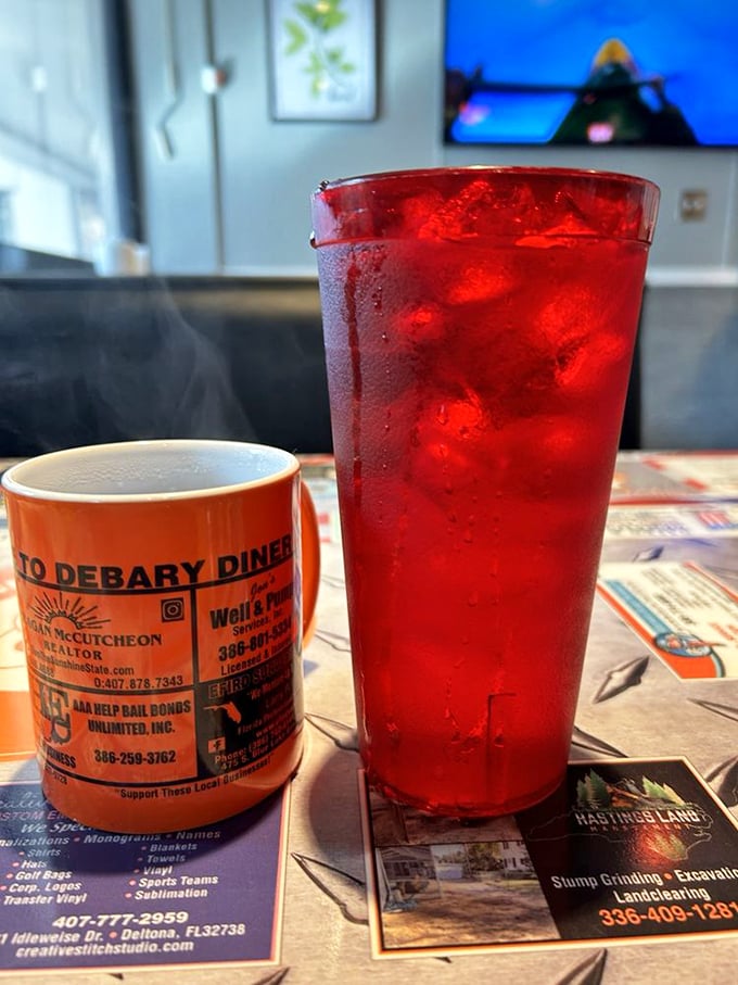 Coffee and conversation &ndash; the lifeblood of any great diner. This mug promises a day as bright as its orange hue.