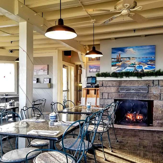 Cozy up by the fireplace when the coastal breeze gets nippy. It's like a warm hug for your lobster-filled belly.