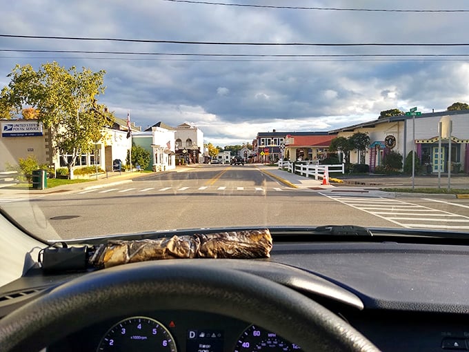 Cruising into charm central! This downtown drive feels like you're navigating through a vintage postcard come to life.