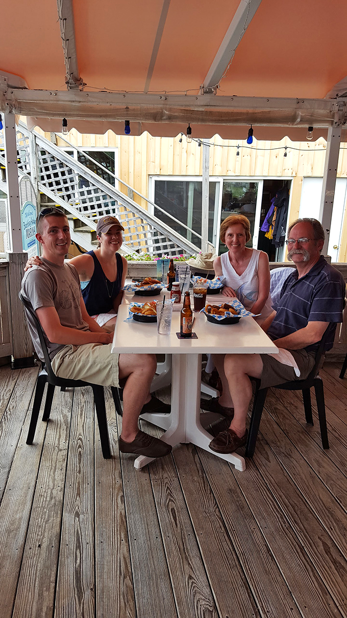 McSeagull's deck: where every table comes with a side of breathtaking views. Soak in the harbor sights while you sip and savor.