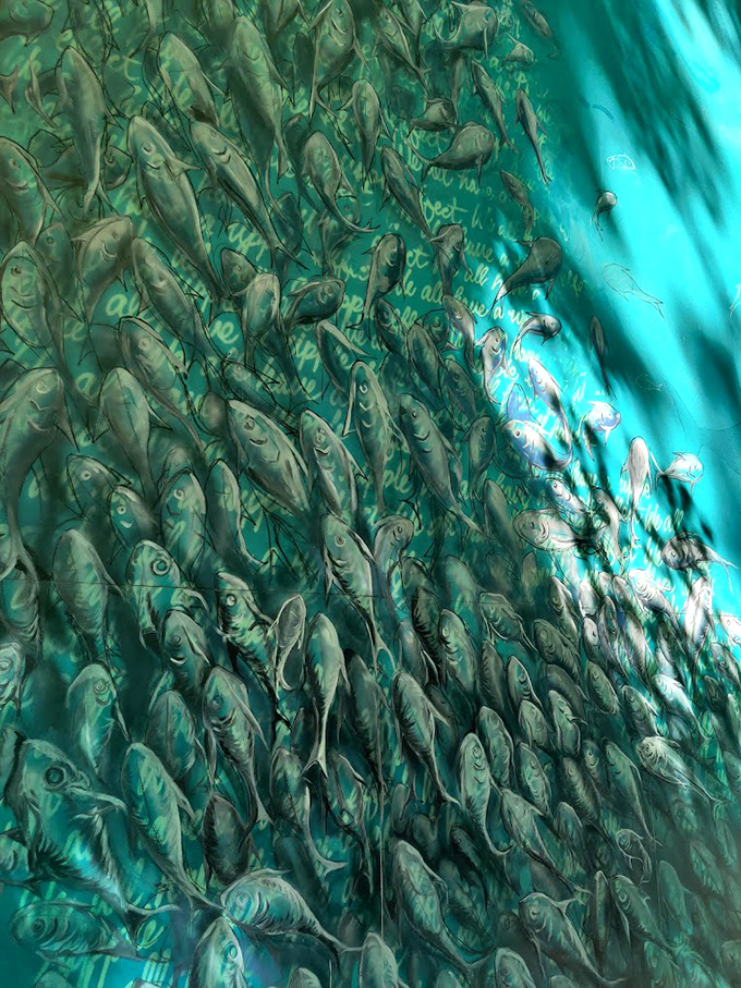 A school of fish or a fever dream? This mesmerizing mural makes you wonder if you've stumbled into an underwater fantasyland.