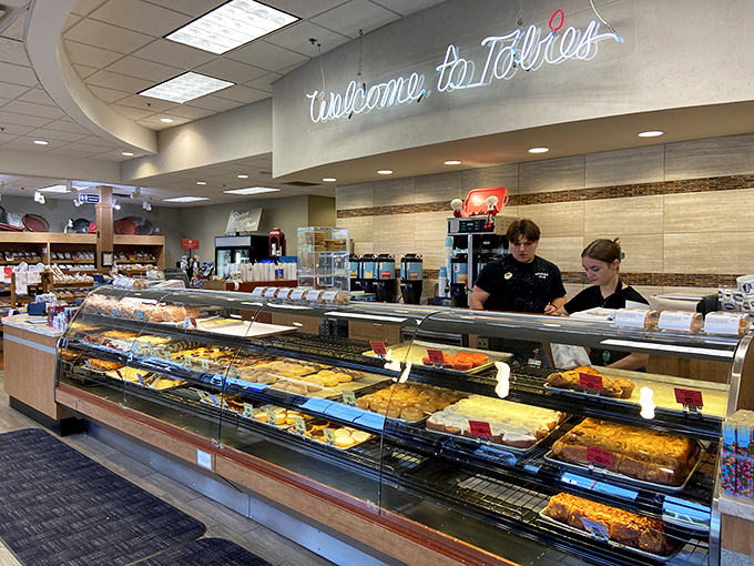 The unsung heroes of your food coma - Tobie's staff, serving up smiles faster than you can say "maple bacon donut."