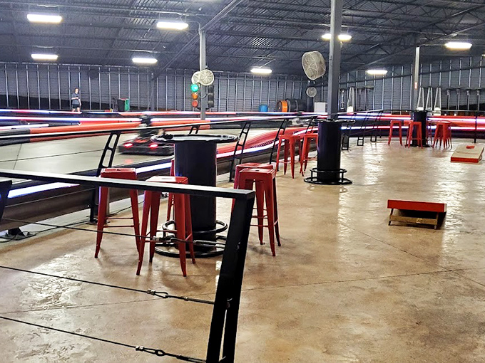 The atmosphere here is electric - literally! With karts charged and ready, it's like the starting line of the Indy 500, but with less pressure and more fun.