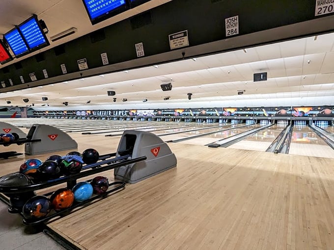 A rainbow of bowling balls awaits their moment of glory, each one hoping to be the next strike-maker.