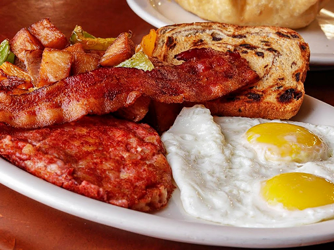 Morning perfection: Crispy bacon, farm-fresh eggs, and golden toast - sometimes the classics are all you need. Photo credit: 5th Avenue Cafe