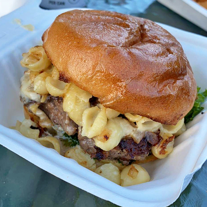 Mac and cheese meets burger in a combination that would make both your cardiologist wince and your taste buds dance.