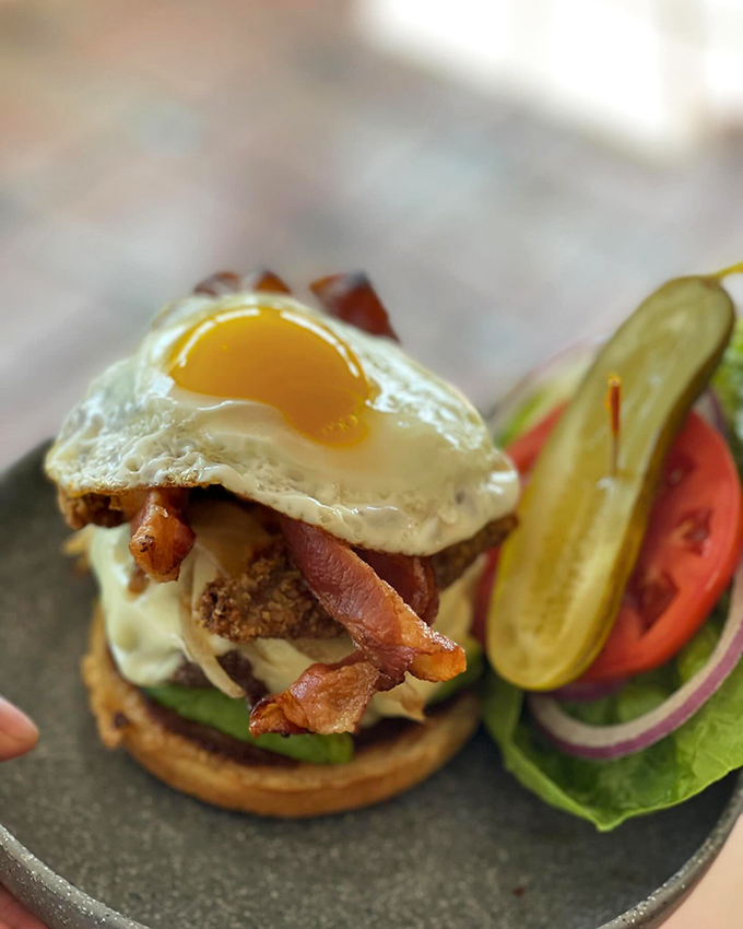 When a burger puts on its Sunday best - complete with a perfectly fried egg hat.