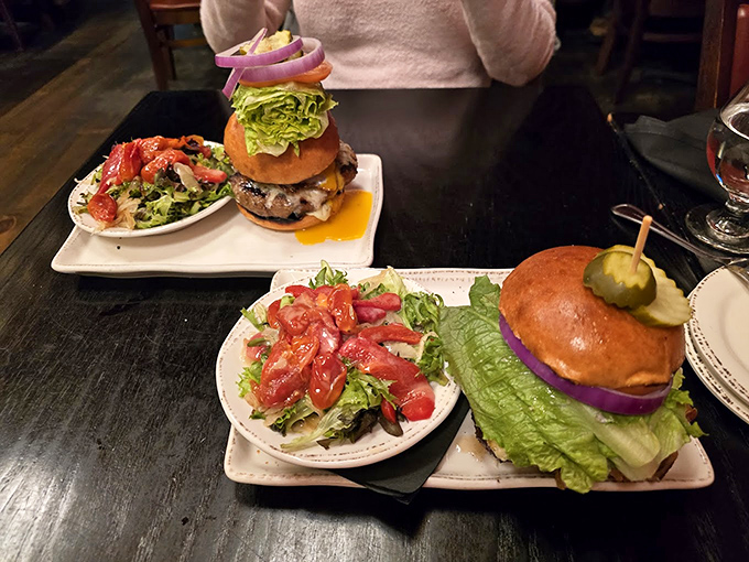 Two burgers, two salads, infinite possibilities. The fresh greens provide the perfect counterpoint to those juicy patties.