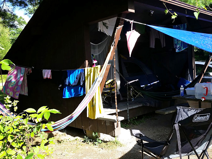 Home sweet... lean-to? Embrace your inner pioneer with a dash of summer camp nostalgia. S'mores and ghost stories sold separately.