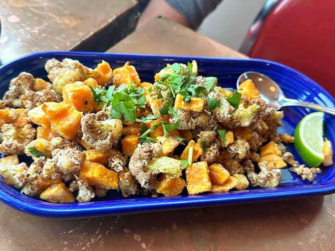 Cauliflower and sweet potatoes prove that vegetables can party just as hard as their meaty counterparts. Photo credit: Ella P.