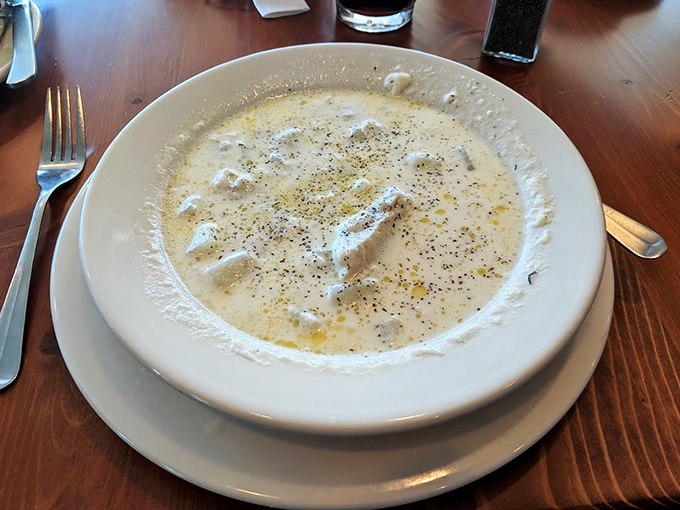 A bowl of creamy New England clam chowder that's thick enough to make Manhattan jealous.