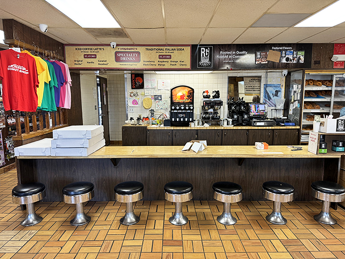Pull up a stool and stay awhile. This counter is the front row seat to the greatest show on earth: fresh donuts!