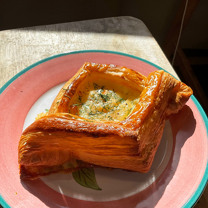 This flaky pastry vessel, filled with herbs and goodness, looks like it sailed straight from heaven's kitchen.