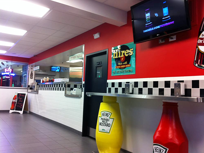 Classic Americana meets modern comfort, with checkerboard tiles and vintage signs creating the perfect hot dog habitat.
