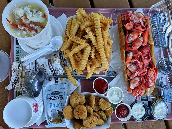 A feast fit for a coastal king: seafood stew, crispy fries, and a lobster roll that's worth every mile driven.