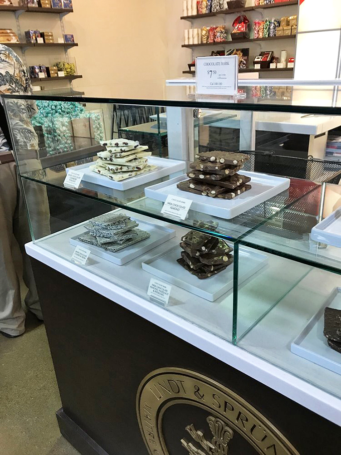 Chocolate bars on display, tempting us mere mortals. Resistance is futile when faced with such artisanal allure.