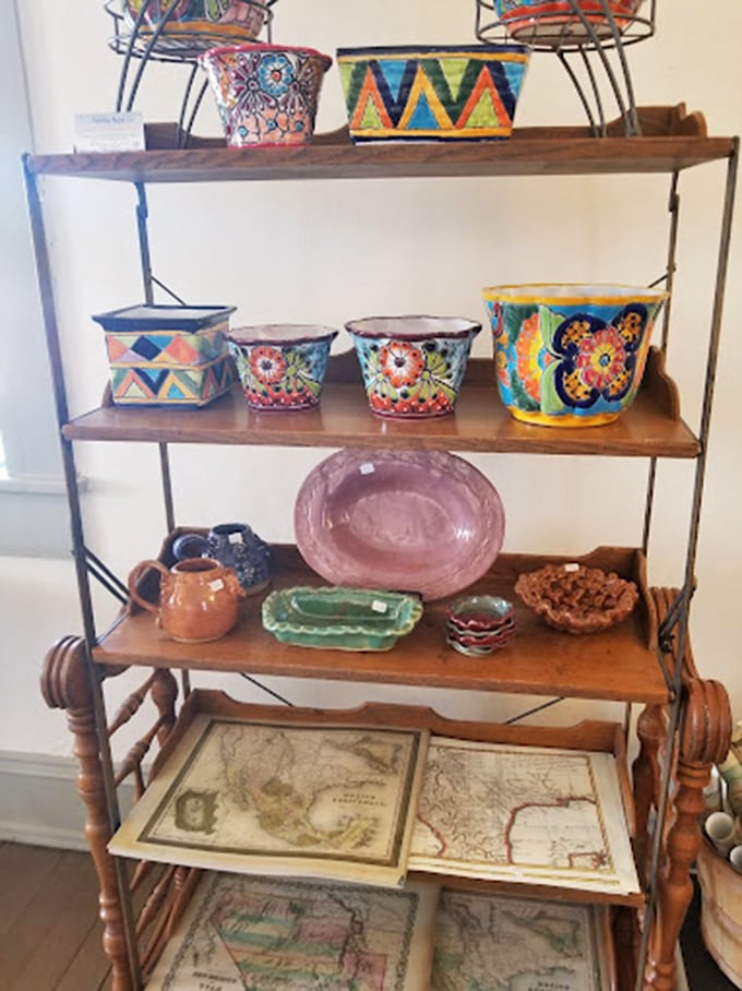 Colorful pottery and vintage maps share shelf space, bridging the gap between Arizona's past and present.