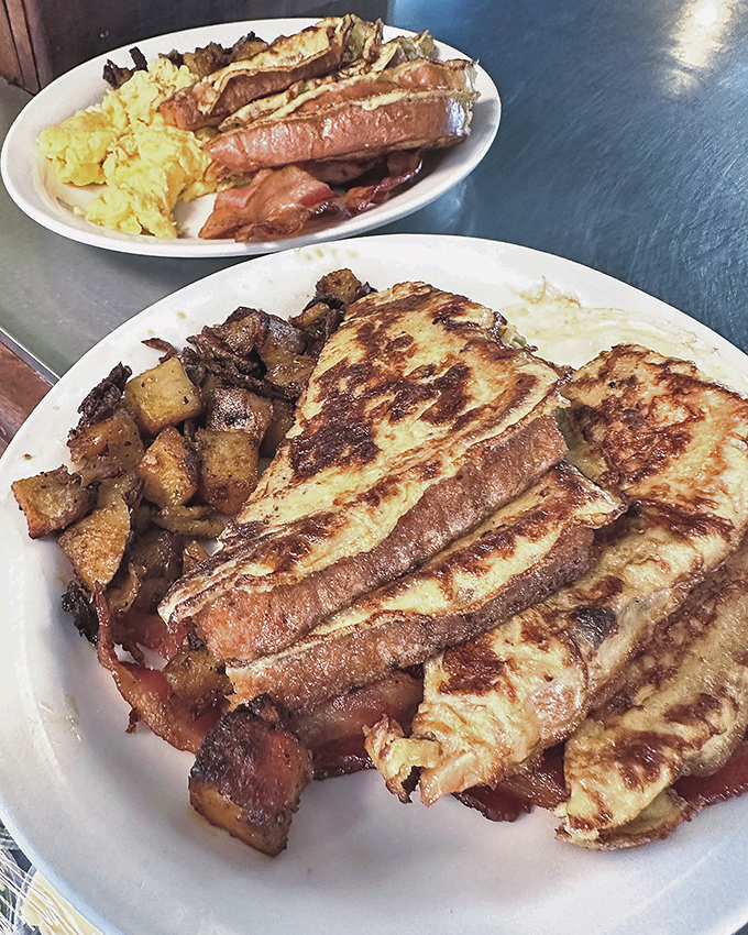 French toast that's more indulgent than a Parisian vacation. Golden-brown, crispy edges give way to a custardy center that's magnifique!