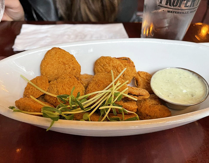 Golden-fried pickle chips that crunch like potato chips but pack way more personality. A perfect bar snack revelation.