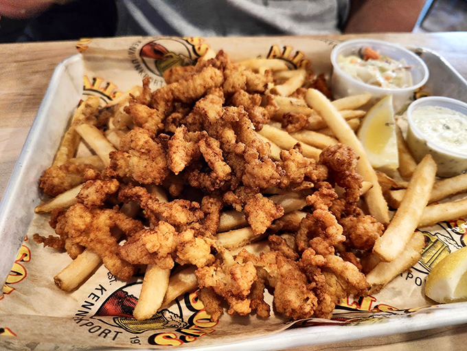 Fried clams so perfectly golden and crispy, they make other seafood jealous. Served with classic tartar sauce and lemon. Photo credit: aleksandra kudin