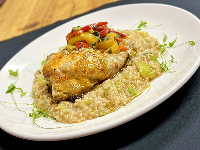 Perfectly grilled fish with a golden sear that speaks of skillful preparation and fresh-from-the-ocean flavor.