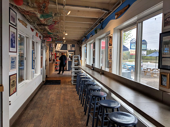 Where maritime memorabilia meets modern comfort, creating the perfect backdrop for seafood storytelling.