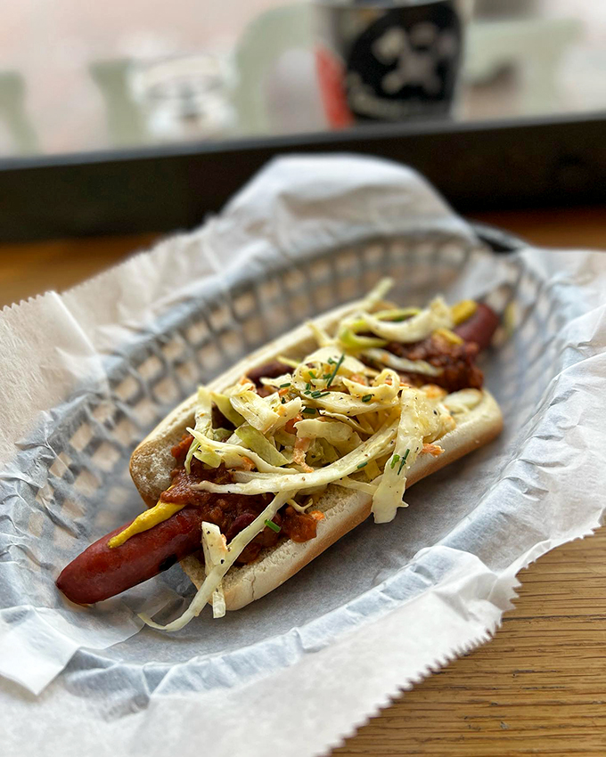 This ain't your average ballpark frank. This gourmet dog is dressed to impress, topped with enough fixings to make a salad bar jealous.