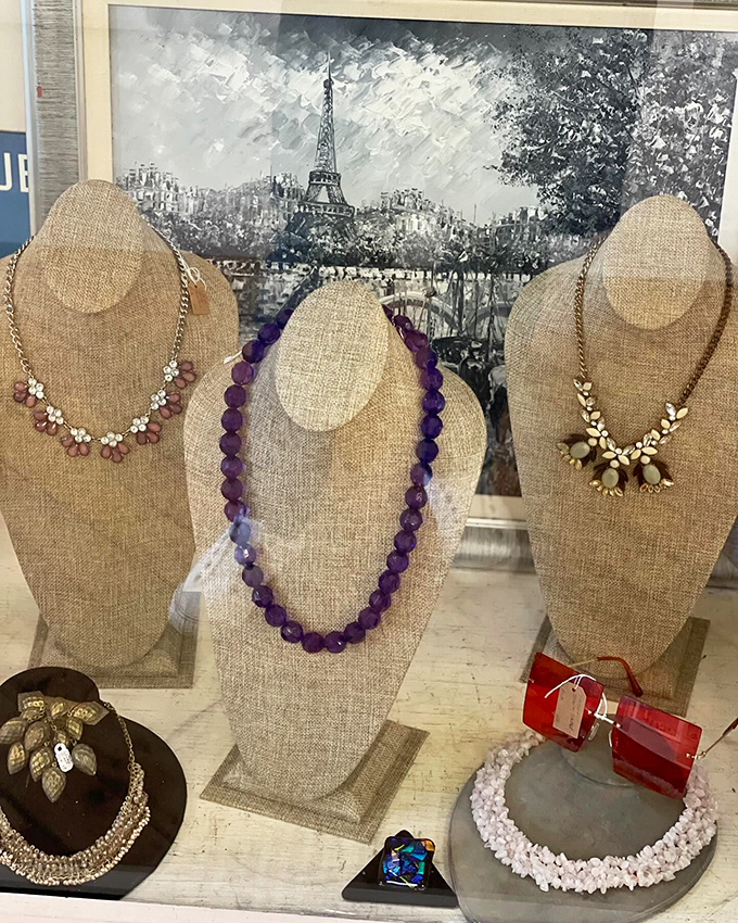 These aren't your typical mall accessories - each necklace tells a story of fashion evolution against Paris's timeless backdrop.