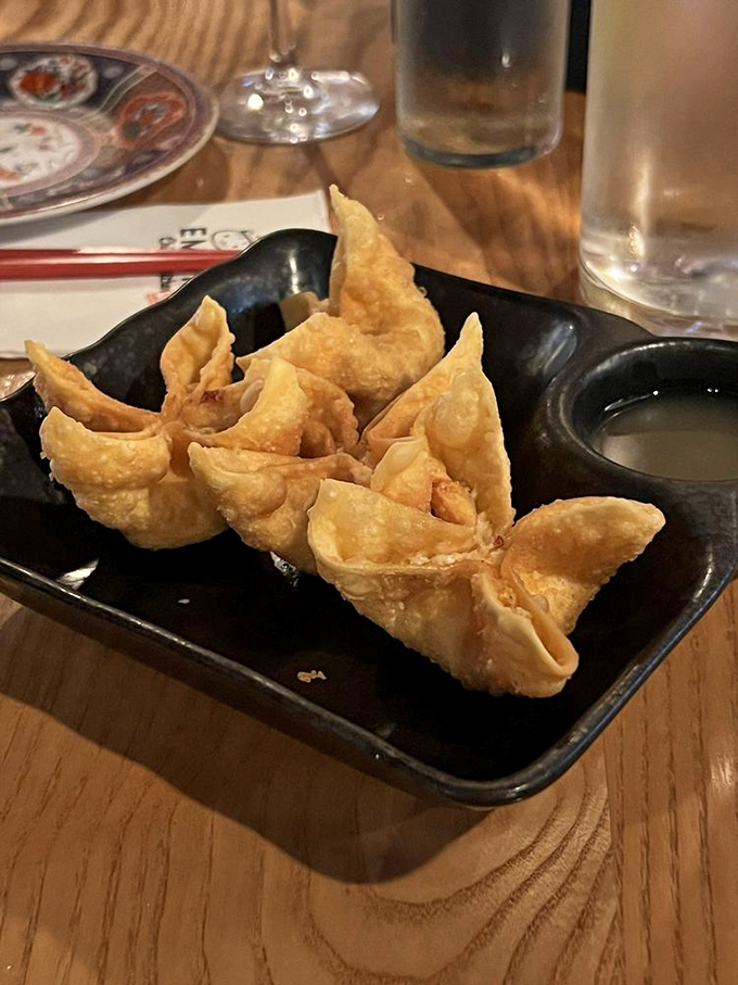Lobster Rangoons: where Maine meets China in a crispy, creamy dance of flavors. It's a cross-cultural love story in every bite!