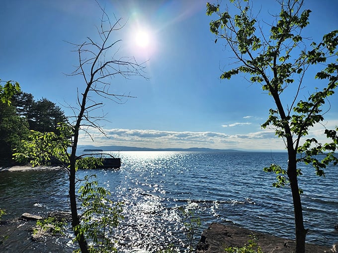 The peaceful shoreline setting adds an extra layer of tranquility to this remarkable stone installation.