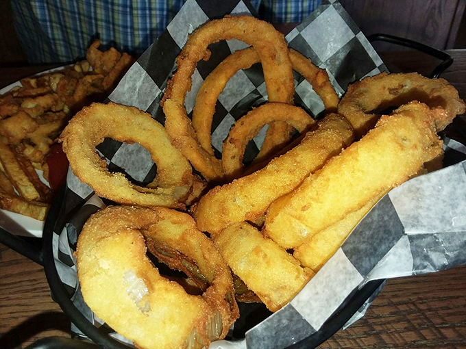 These aren't your average onion rings - they're golden halos of happiness, perfectly stacked like edible Olympic rings.