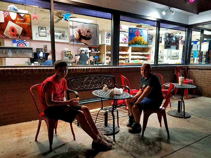 Al fresco donut dining at its finest! Who needs a fancy caf&eacute; when you've got fresh air and frosted delights?