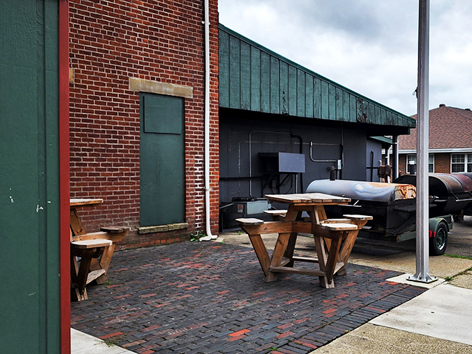 Al fresco feast awaits! This charming outdoor setup is perfect for enjoying your meal while people-watching in picturesque Portsmouth.