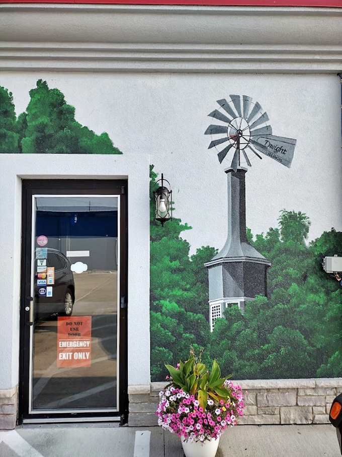 A windmill mural that captures Dwight's small-town charm, complete with picture-perfect pink petunias below.